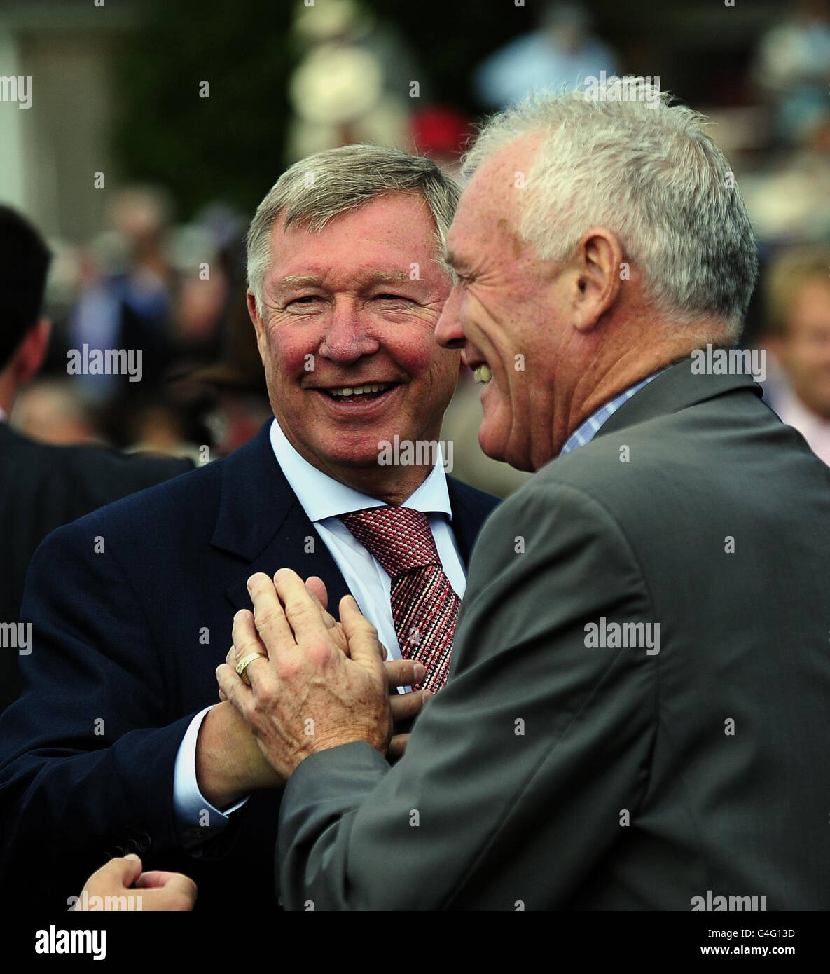 Manchester United manager Sir Alex Ferguson (left) with former Leeds ...