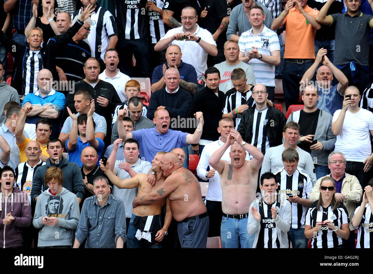 Newcastle united fans show their support in the stands hi-res stock ...