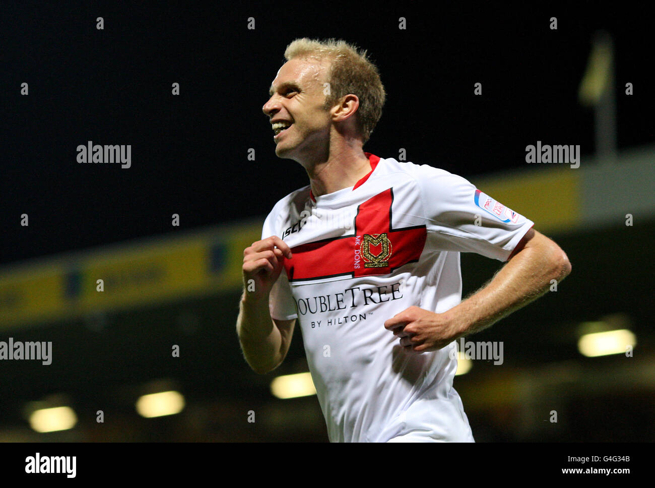 Milton Keynes Dons' Luke Chadwick celebrates scoring his side's third ...