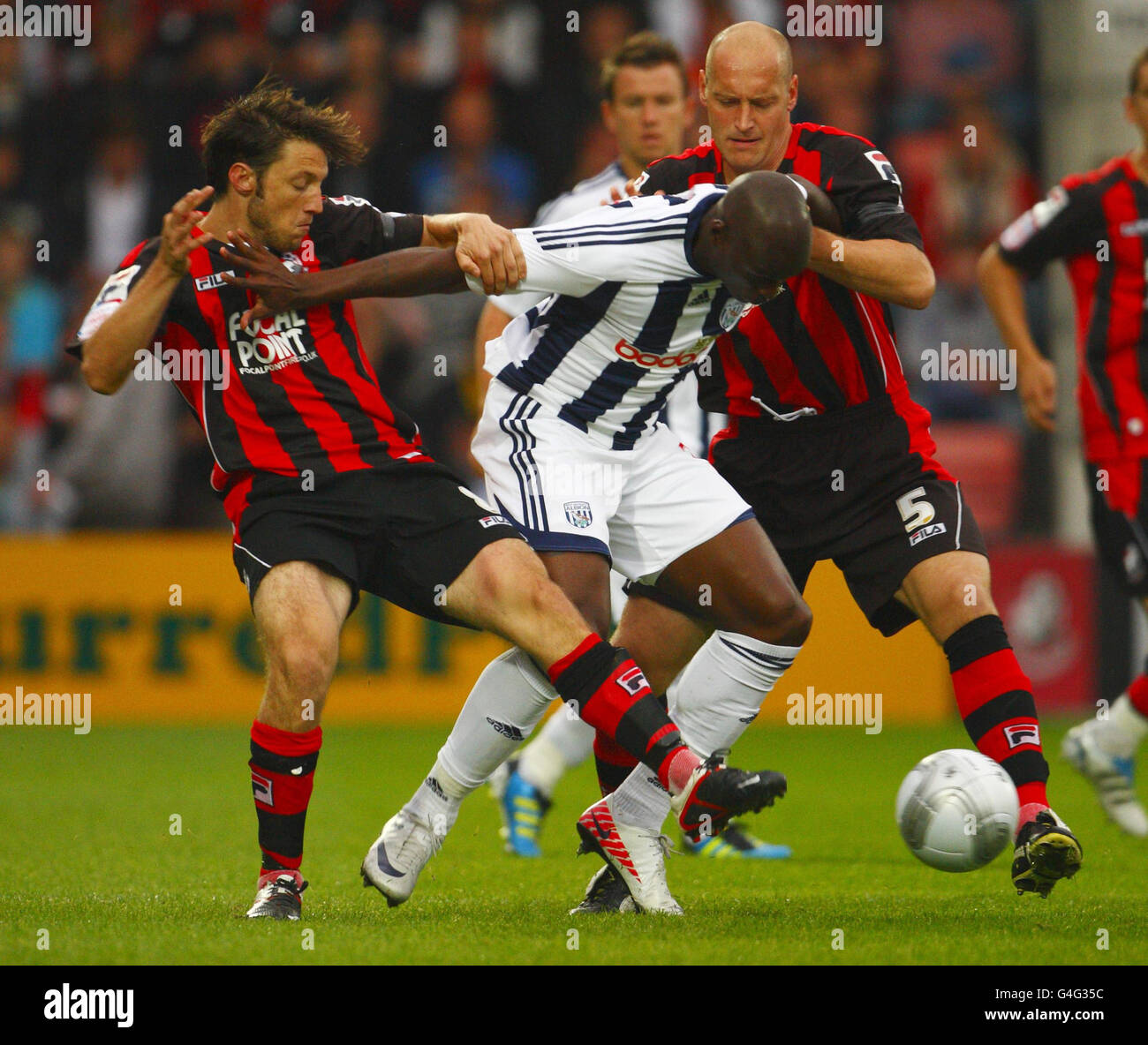 Bournemouth's Harry Arter (left) and Adam Barrett in action against ...