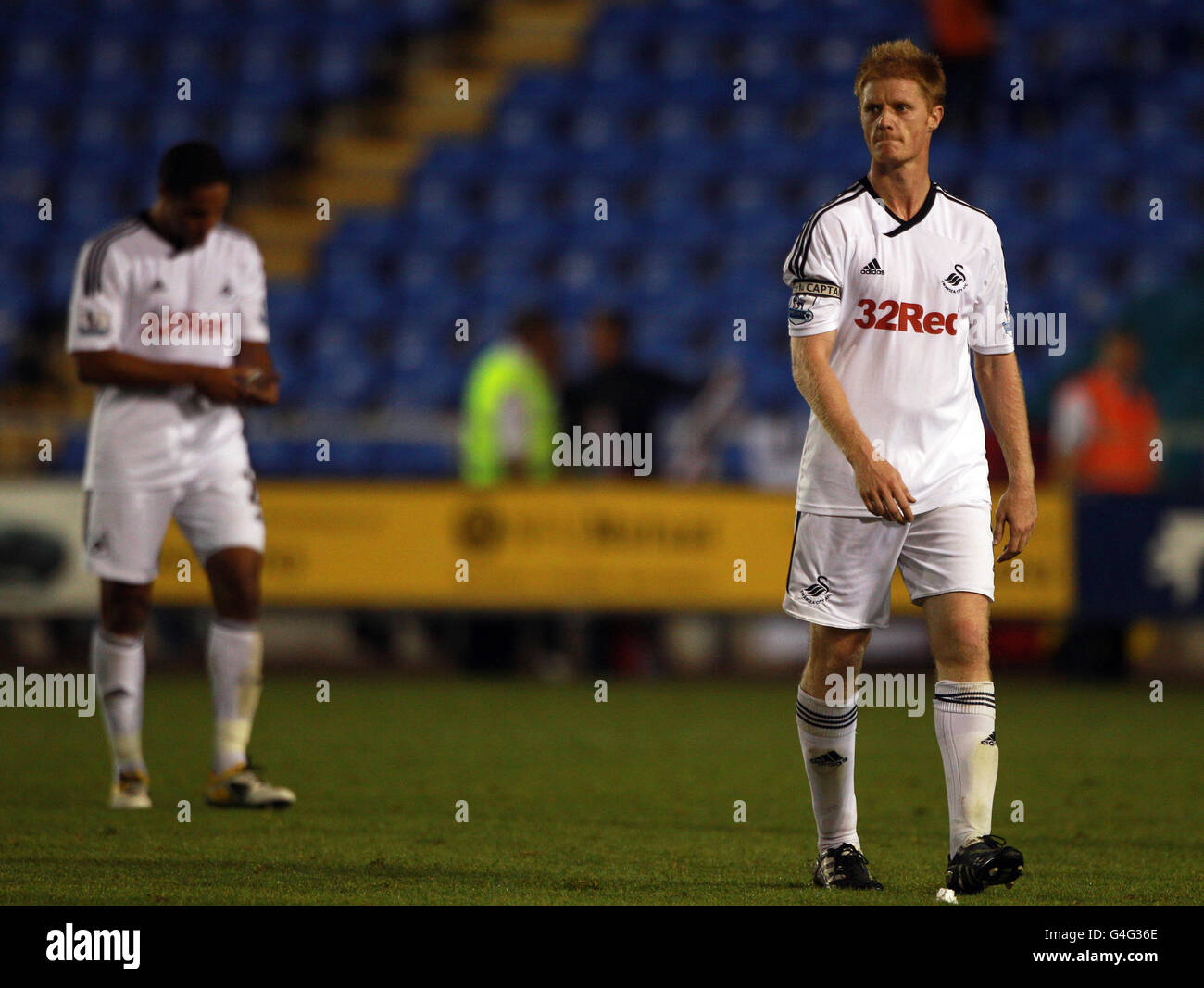 Swansea City's captain Alan Tate (right) and Ashley Williams shows ...