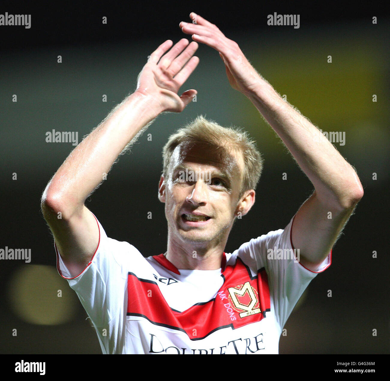 MK Don's Luke Chadwick applauds the fans at the final whistle during ...