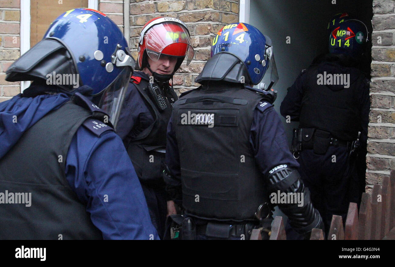 Police raid a house in London as part of Operation Razorback, one of a ...