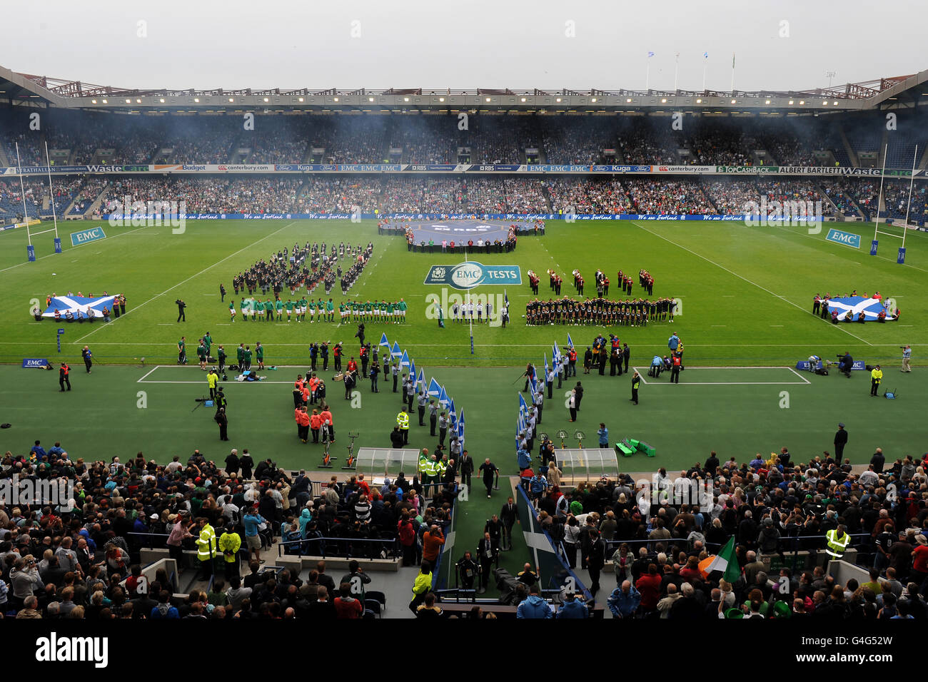 The Scotland and Ireland players line up for the Nation al Anthem as a ...
