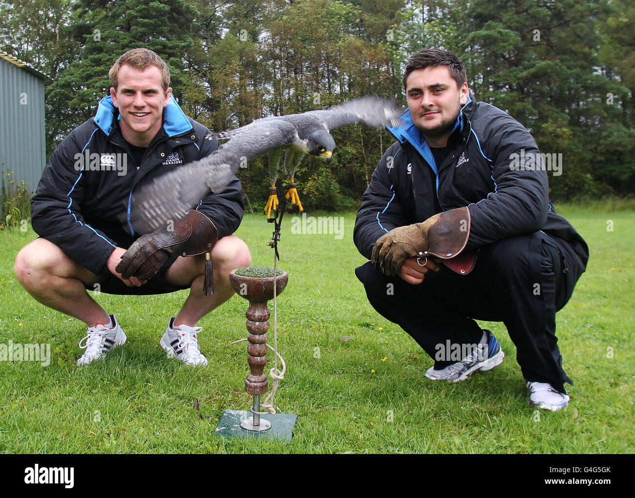 Glasgow Warrior's Chris Fusaro and Rory Pitman pose with Gigha the ...