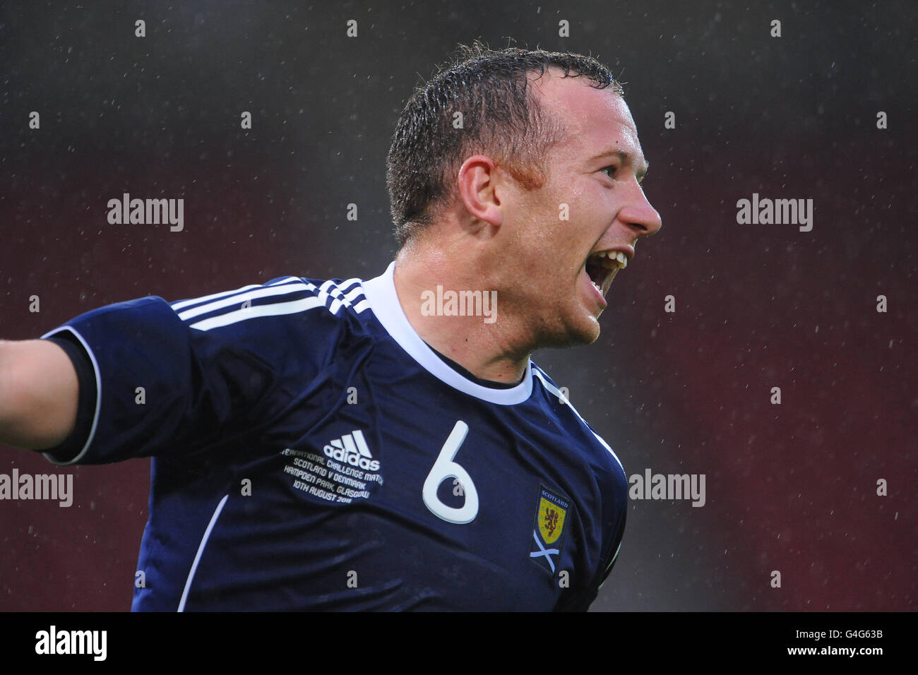 Scotland's Charlie Adam celebrates after his free kick is turned into ...
