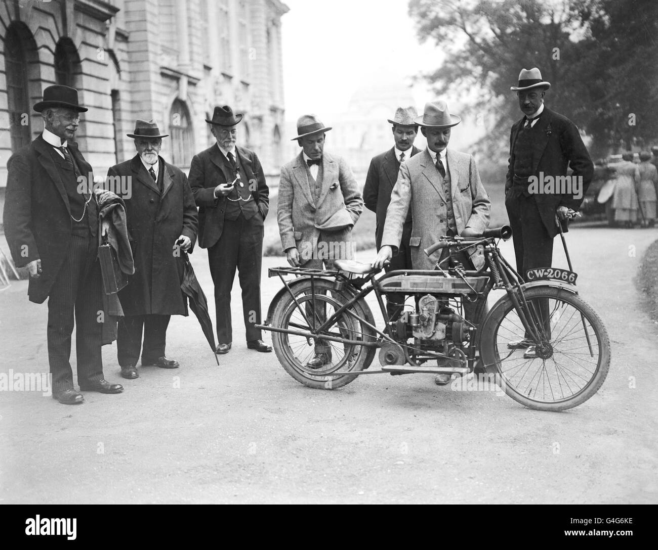 English engineer, Sir Charles Parsons (left) surveys his new invention ...