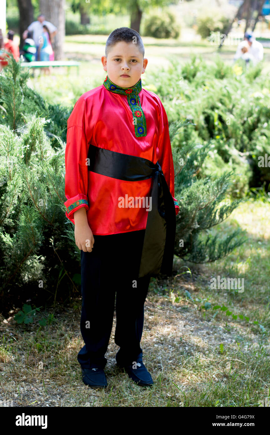 the boy in a red national Russian shirt Stock Photo - Alamy