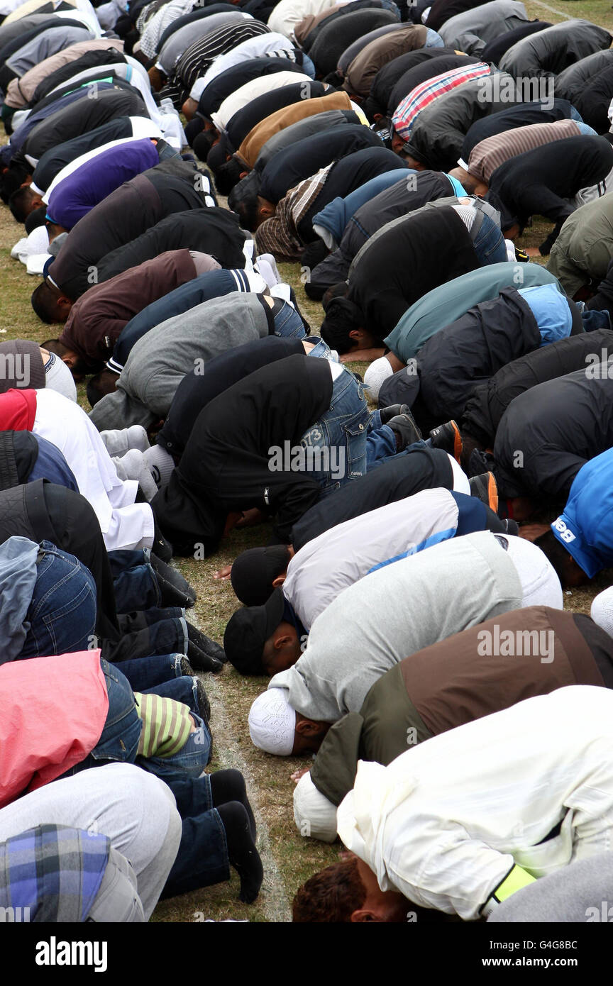 Mourners pray during the funeral of Shazad Ali, Abdul Musavir and their ...