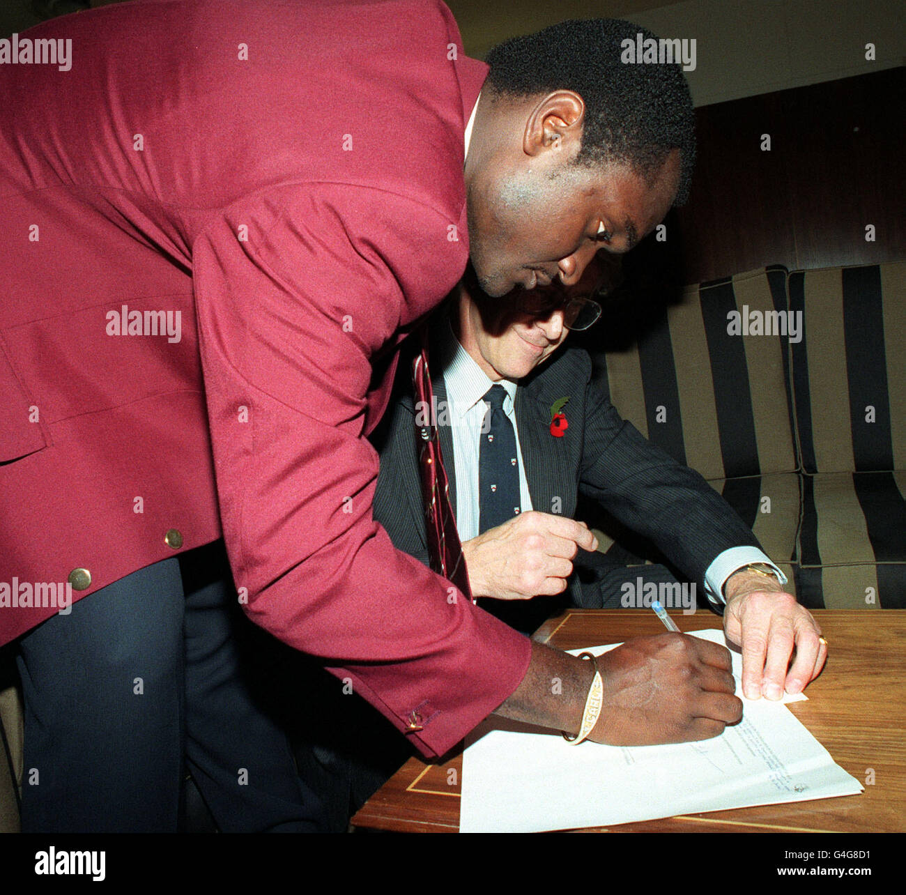 After days of negotiations, West Indies cricketer Carl Hooper signs an ...