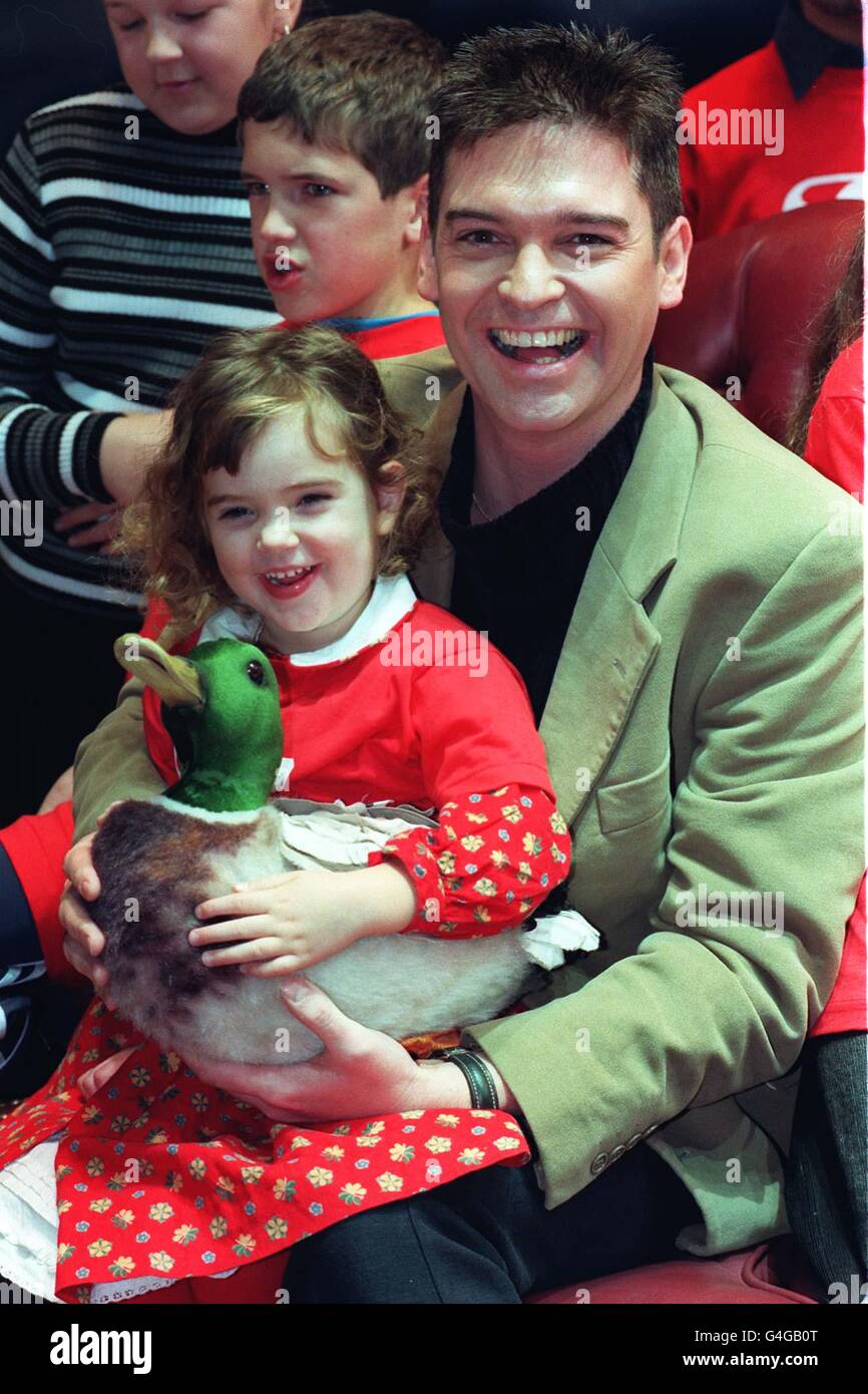 TV presenter Phillip Schofield with Oriane cole, aged 3, and Dab Dab ...