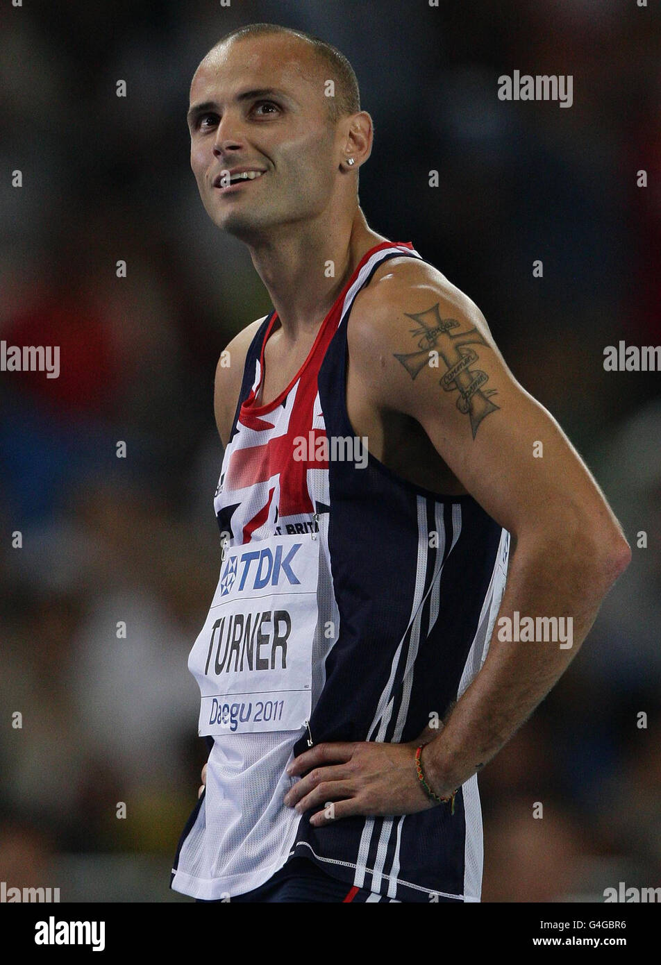 Great Britain's Andy Turner smiles after competing in the men's ...