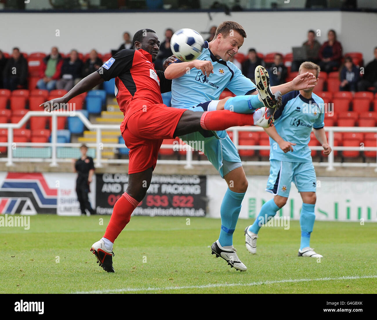 Kettering Town's Jean-Paul Marna (left) and Cambridge United's Joshua ...
