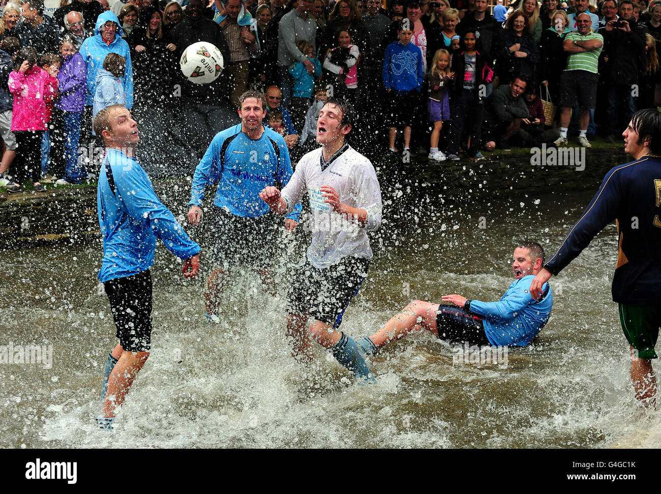 Football in the River Stock Photo - Alamy