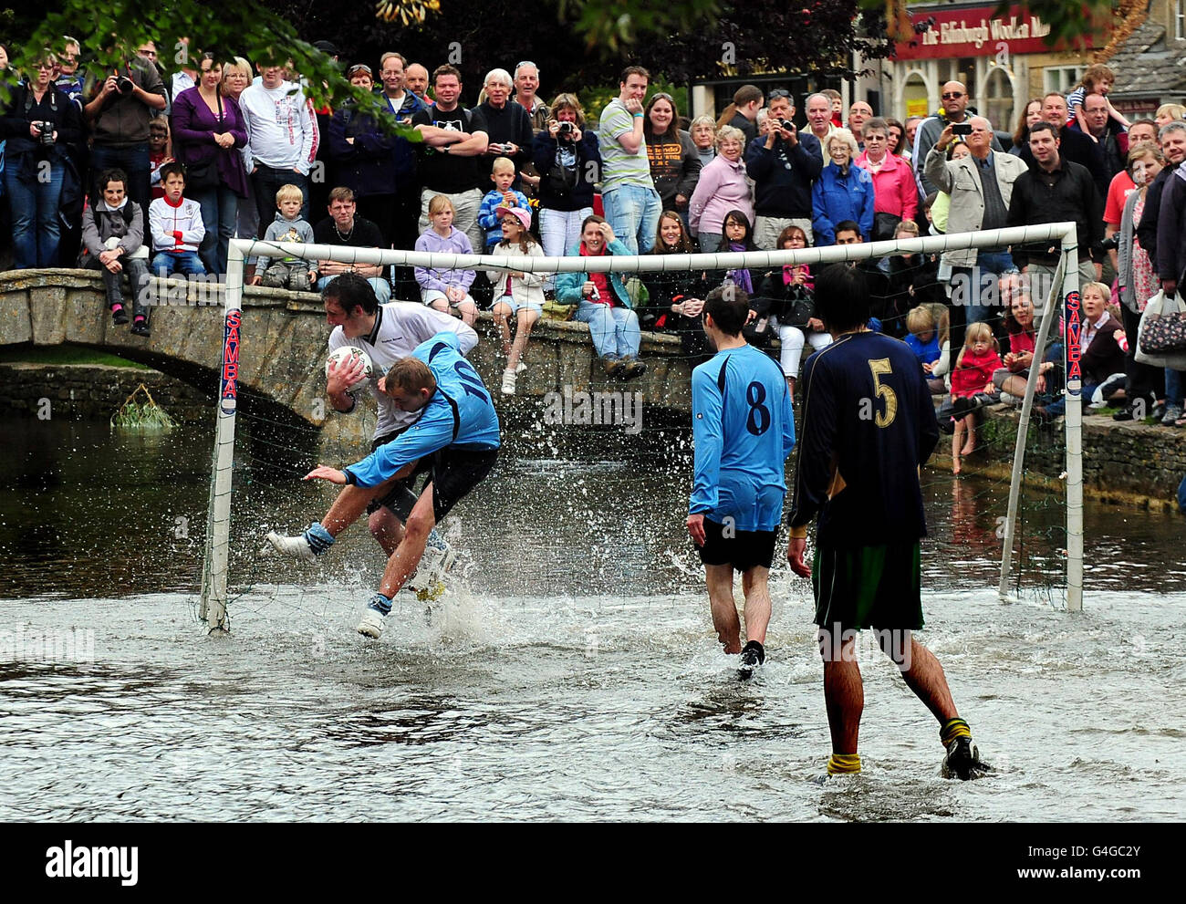 Football in the River Stock Photo - Alamy