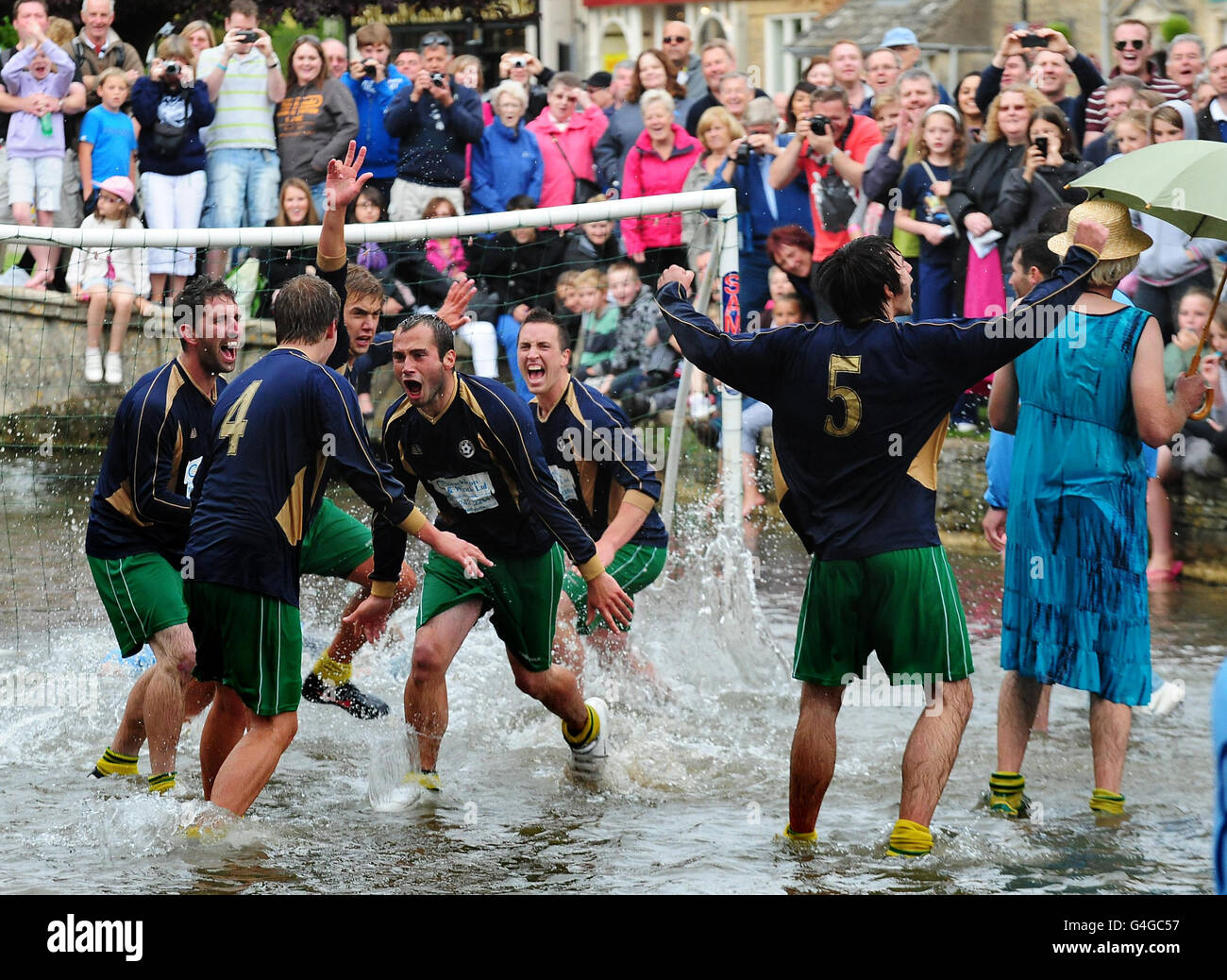 Football in the River Stock Photo - Alamy