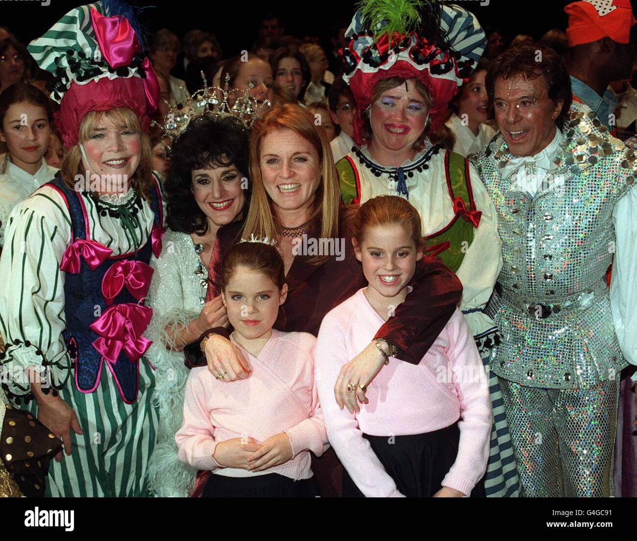 Princesses Beatrice (right) and Eugenie (left) with their mother the ...