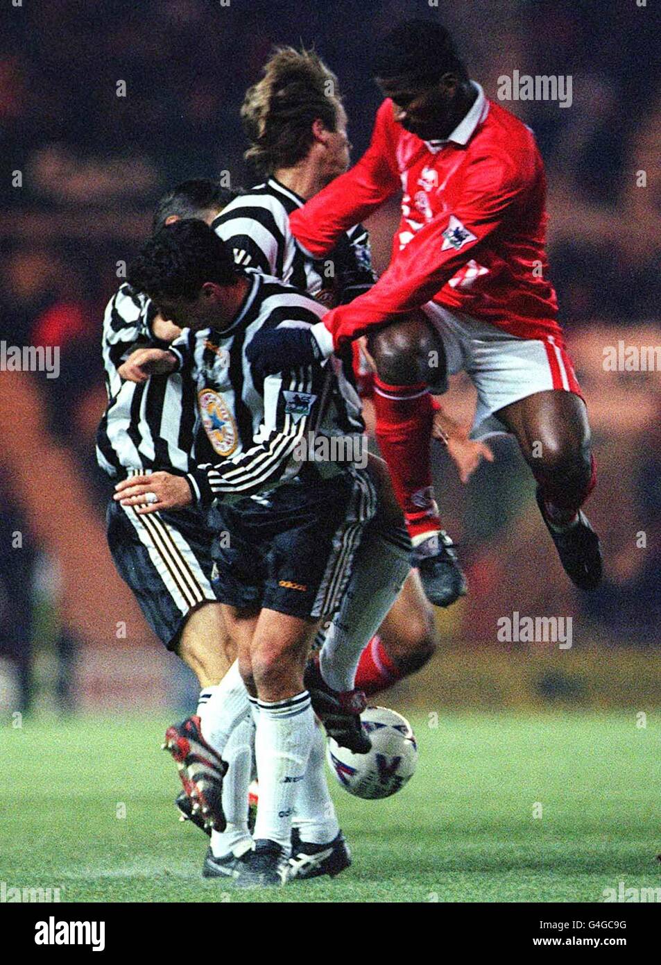 Hamilton Ricard of Middlesbrough (right) leaps on Gary Speed of ...