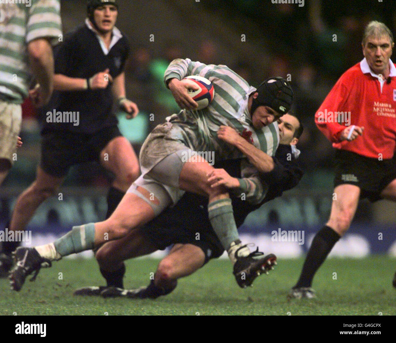 Michael Haslett of Cambridge storms through Oxford defences at the ...