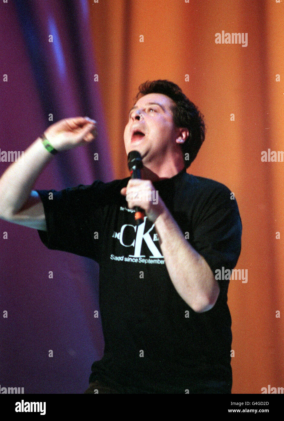 PA NEWS PHOTO 16/3/97 COMEDIAN MARK THOMAS ON STAGE AT THE LONDON ...