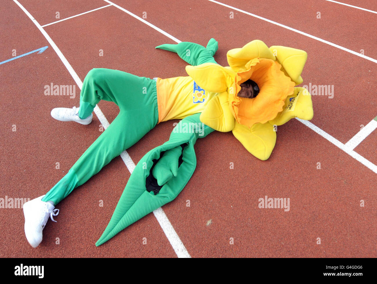 Michael Ryan dressed as mascot Daffy from Marie Curie Cancer Care takes ...