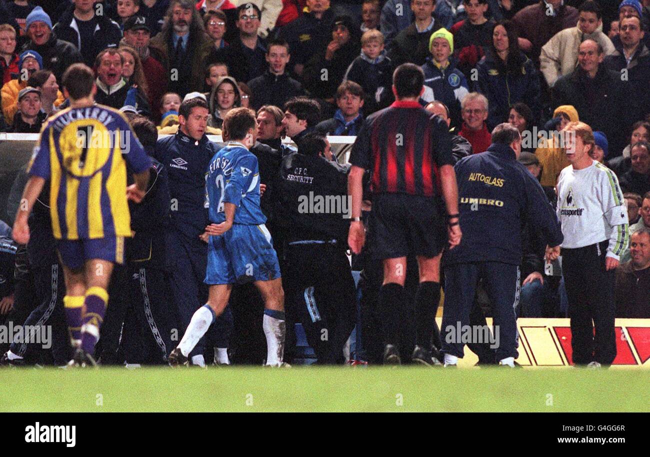 Referee walks over to dispute Stock Photo - Alamy