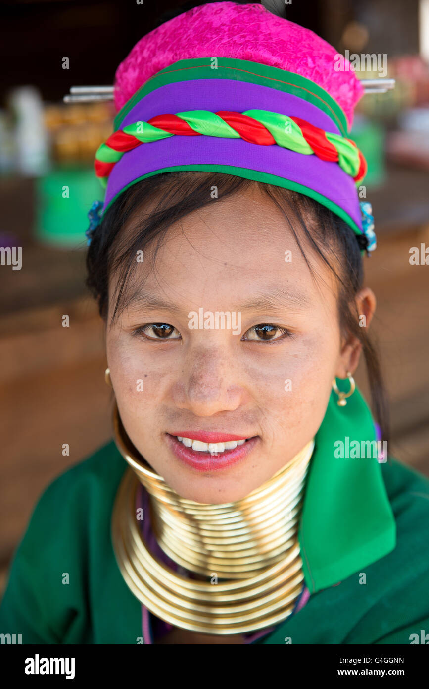 Portrait of a smiling young Kayan Lahwi (Padaung) woman with brass ...