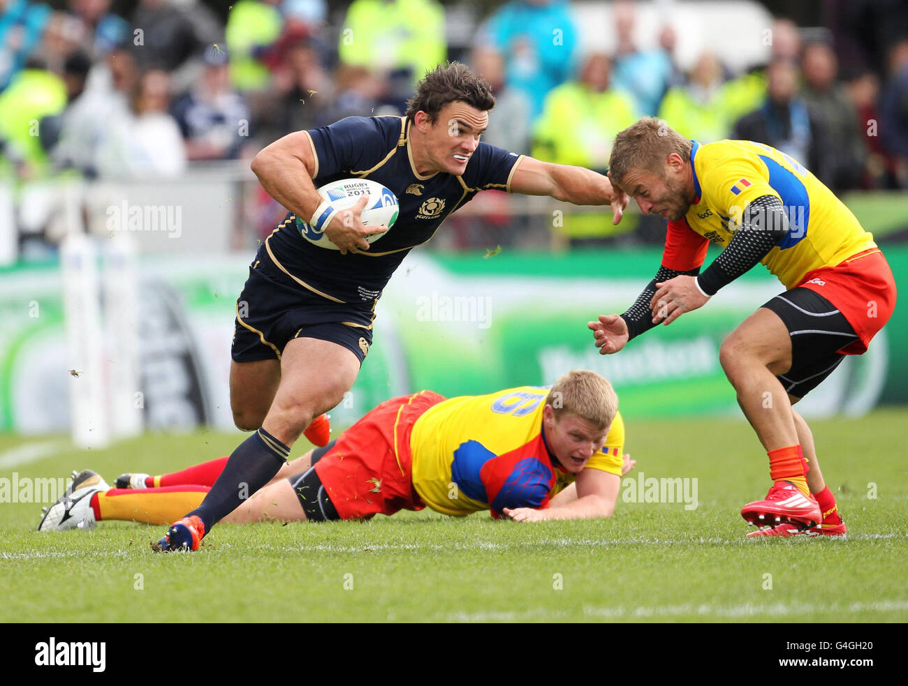 Scotland's Max Evans and Romania's Florin Surugiu during the IRB Rugby ...