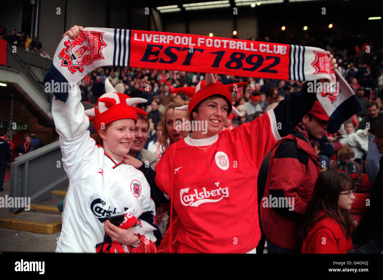 Liverpool football fans proudly display their team colours at anfield ...