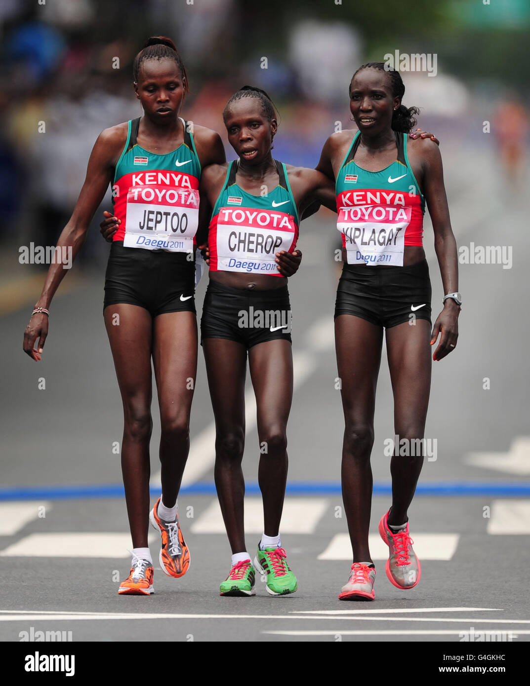 Kenya's L-R: Priscah Jeptoo (runner up), Sharon Cherop (third) and ...