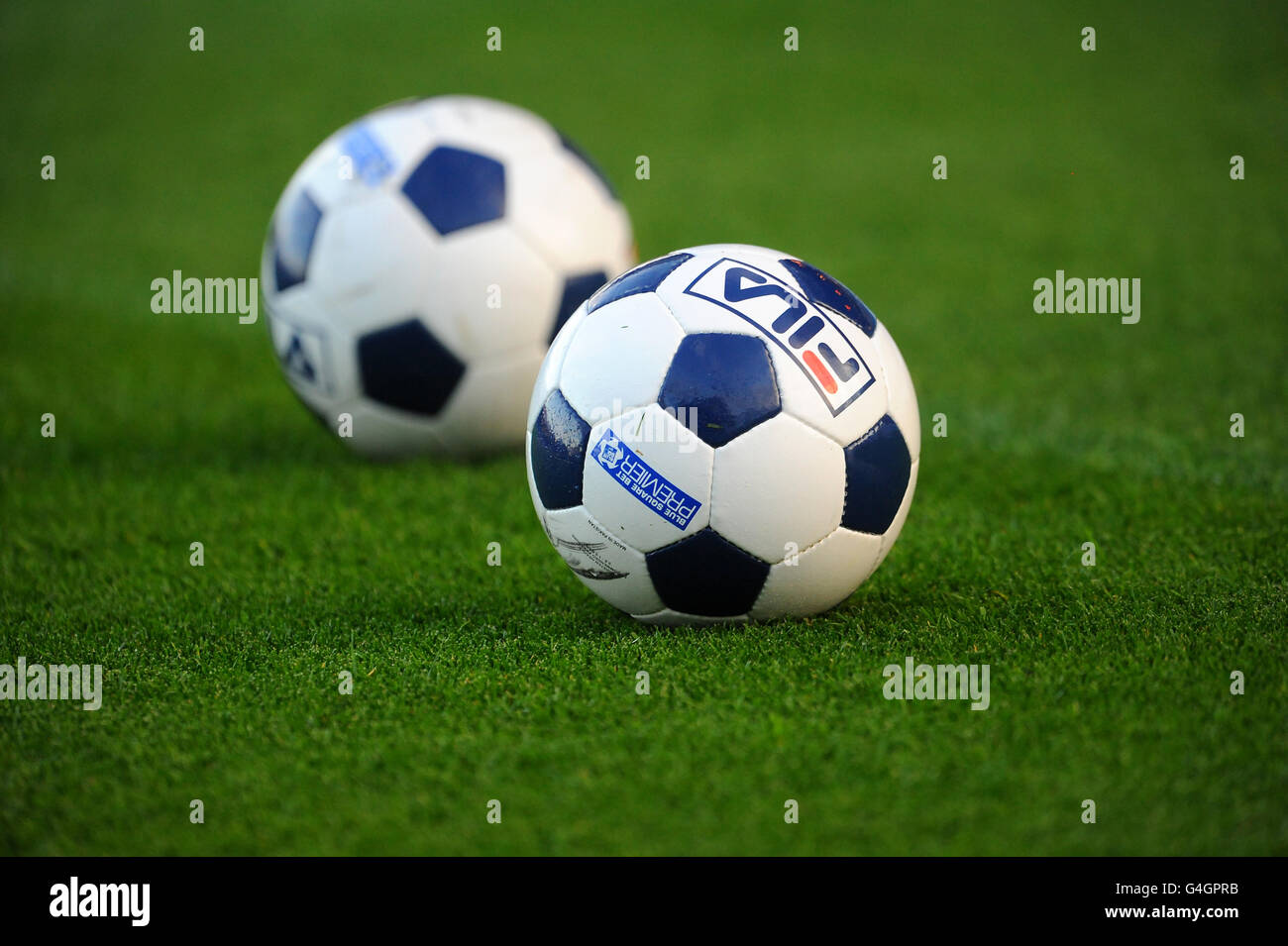 Detail of official Blue Square Premier match balls on the pitch during ...