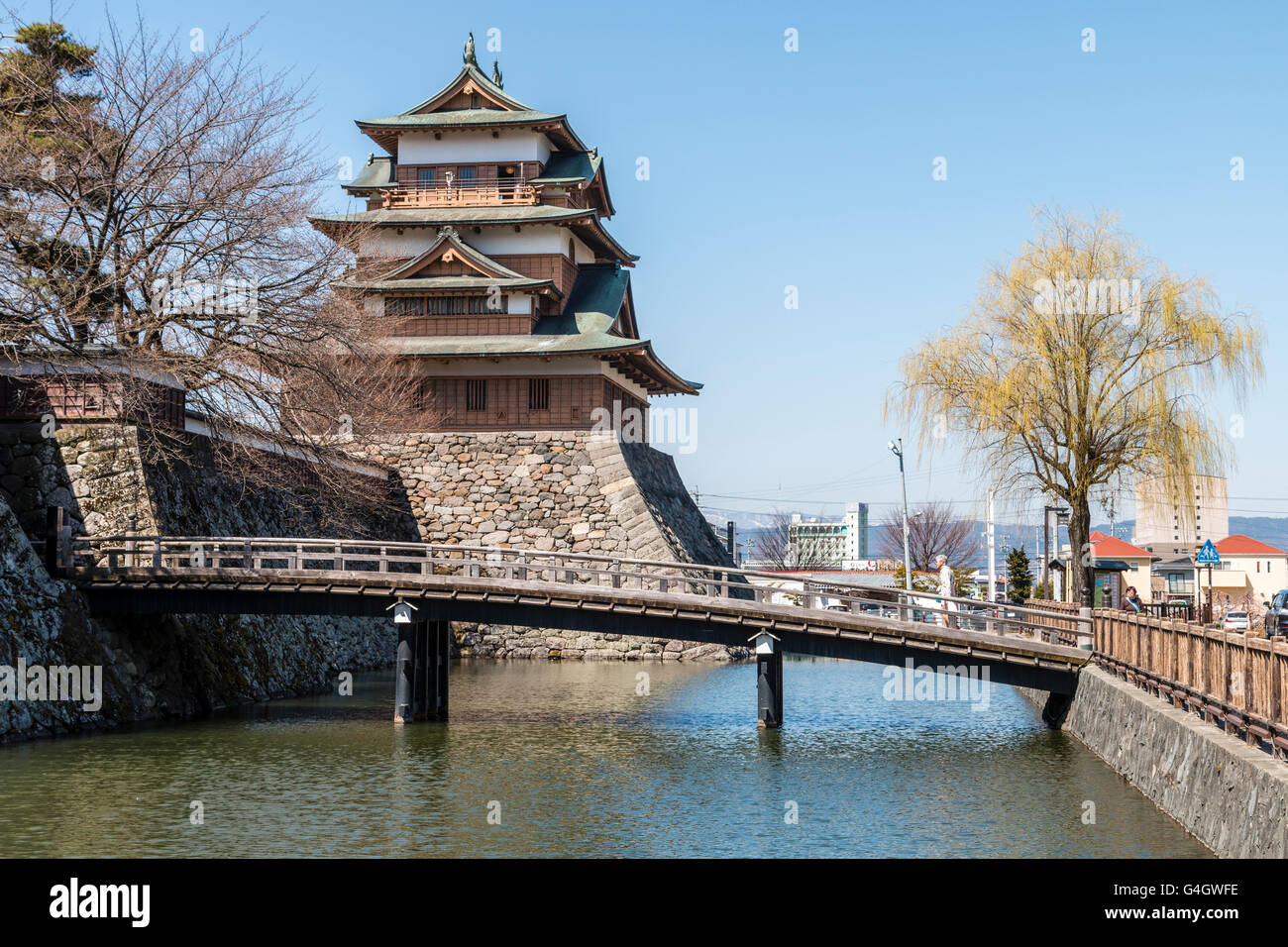 Japan, Suwa. Reconstructed Takashima castle. Kabukibashi wooden bridge ...