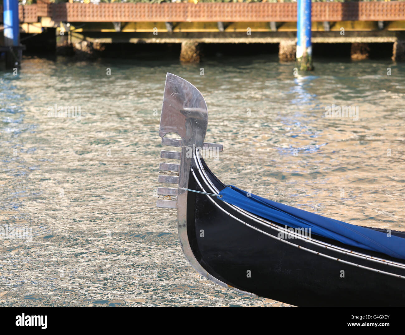 New Venetian gondola sailing the sea near Saint Mark Square Stock Photo ...