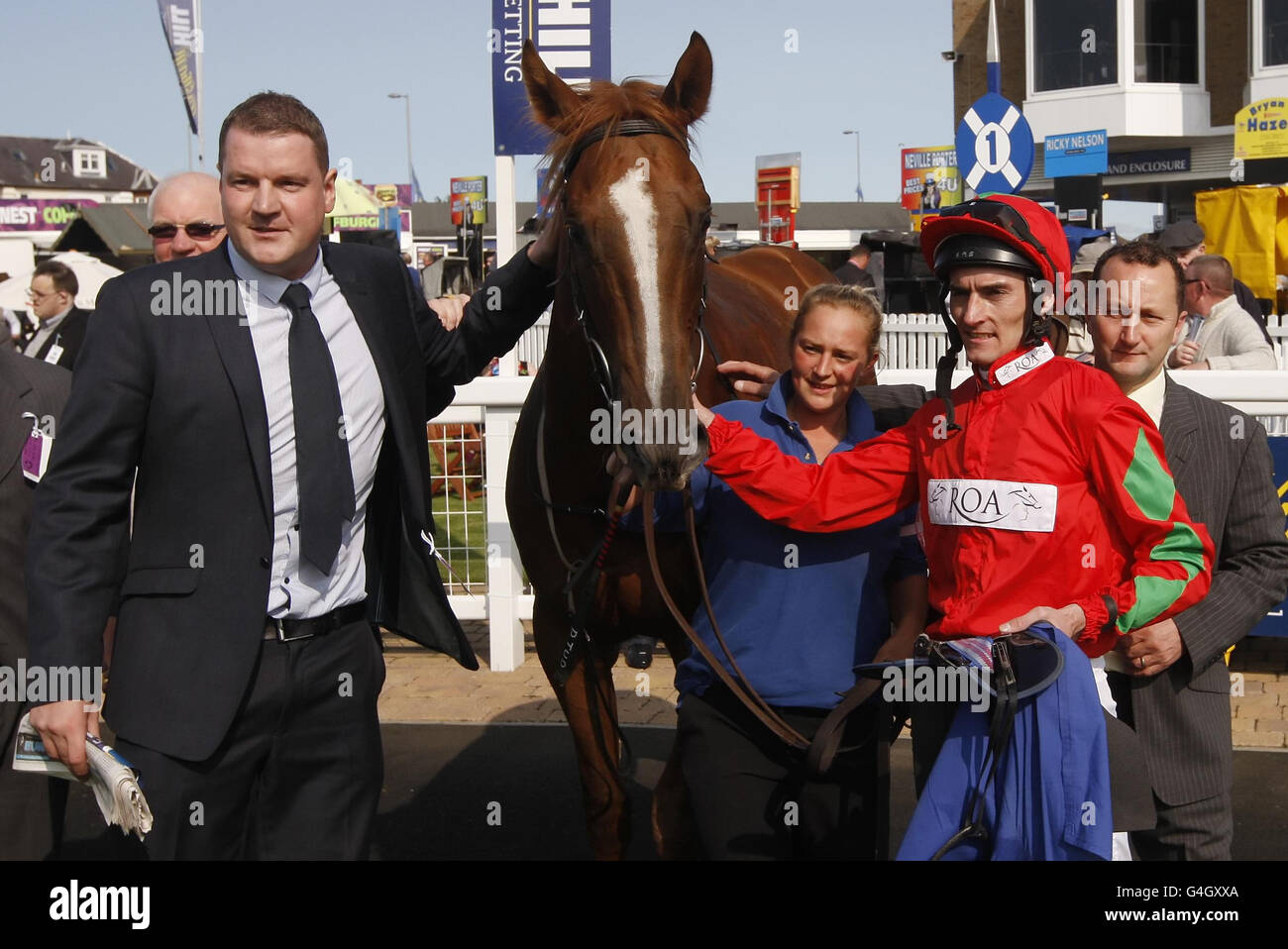 Jockey Daniel Tudhope (second right) with horse Frang Kondiew, Owner ...
