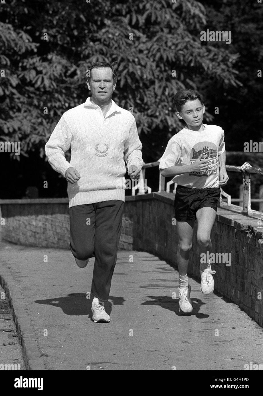 Son by four Black and White Stock Photos & Images - Alamy