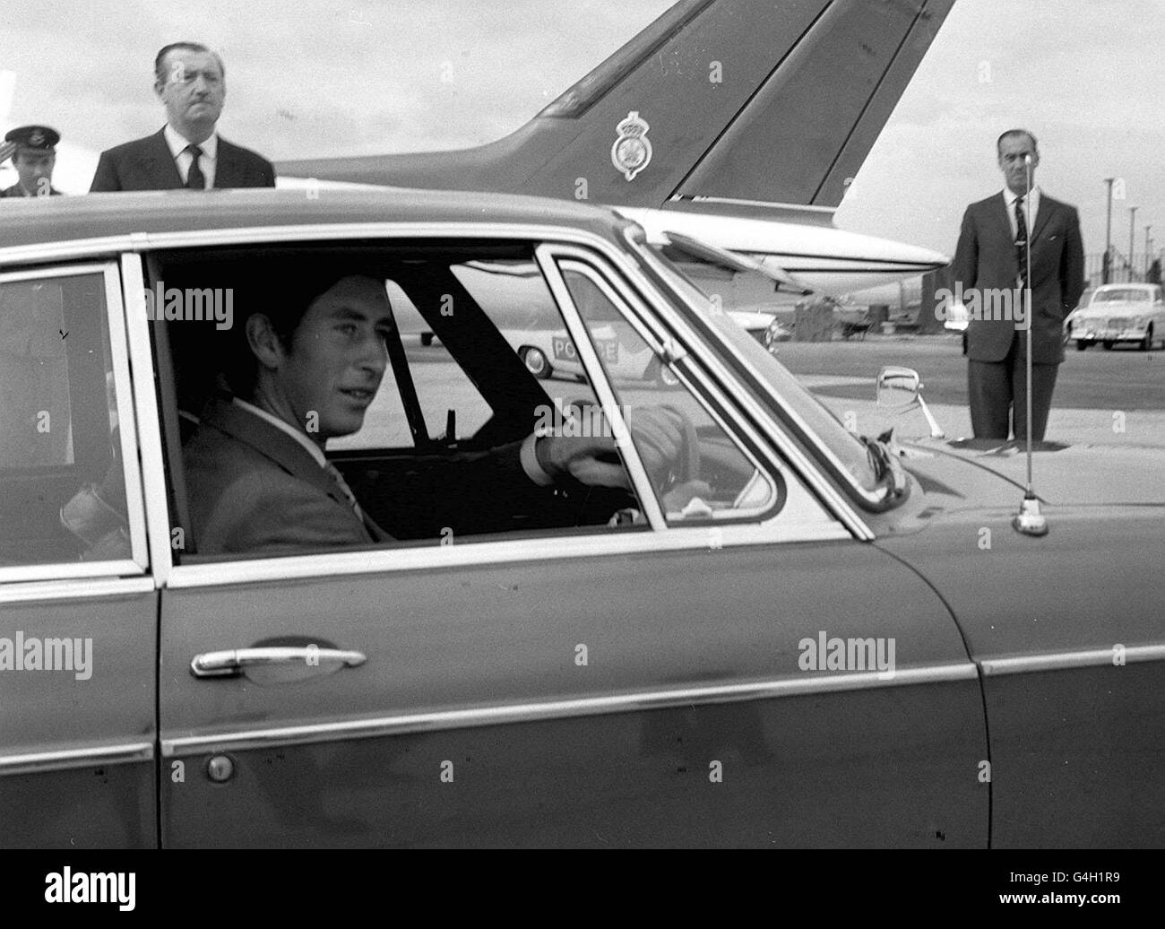 Prince charles driving car hi-res stock photography and images - Alamy
