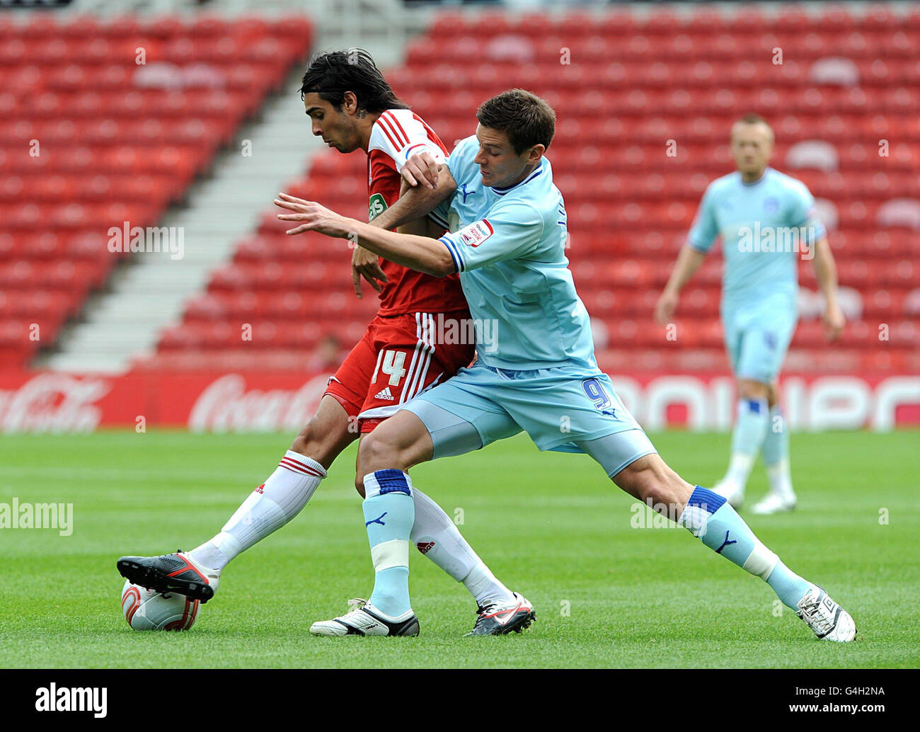 Middlesbrough's Rhys Williams (left) and Coventry City's Lukas ...