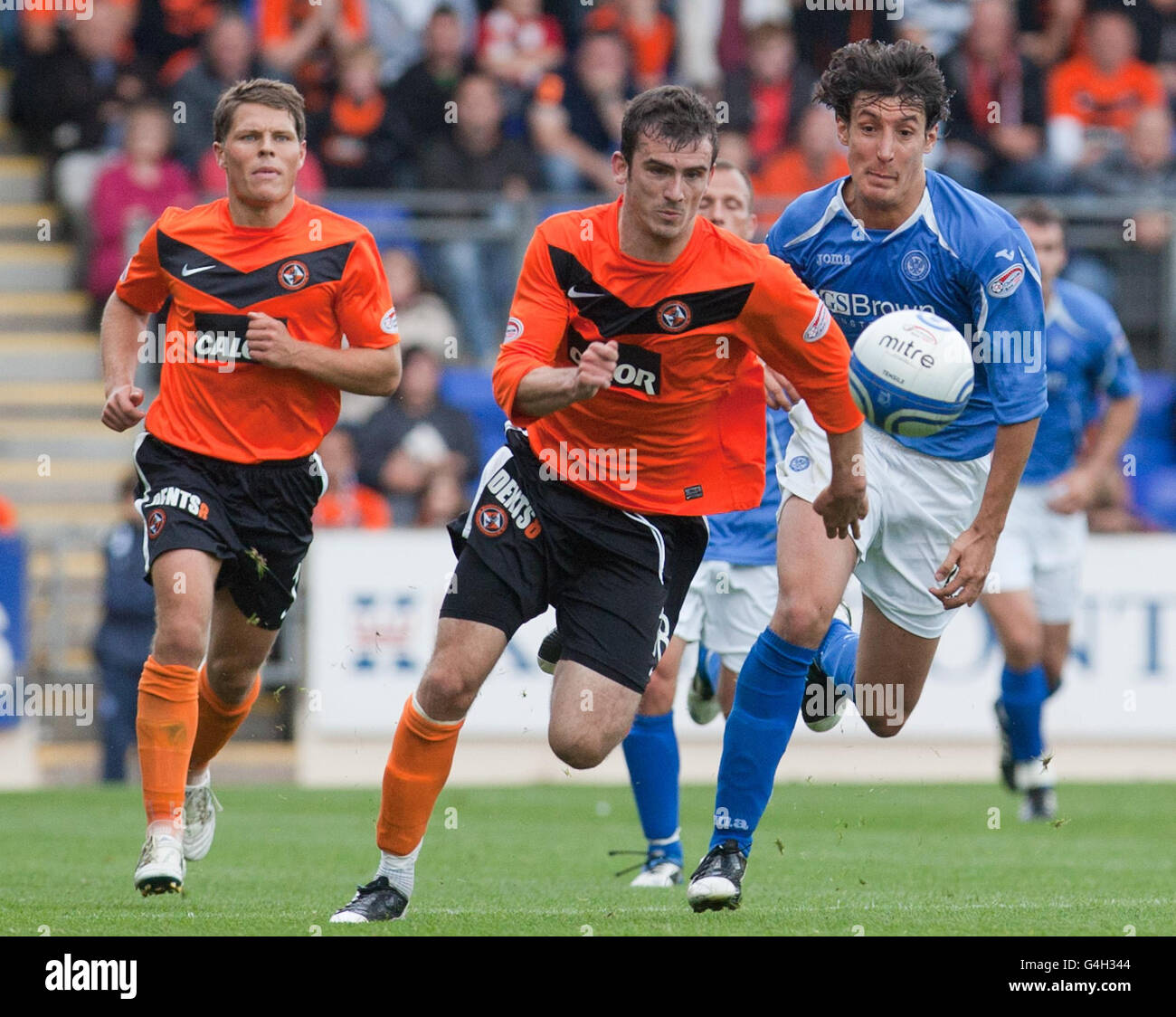 Dundee United's Gavin Gunning vies for the ball with St Johnstone's ...