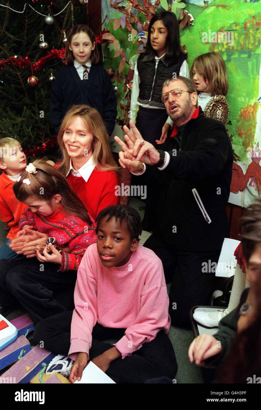 Former Beatle Ringo Starr and his wife Barbara Bach join, from left to ...
