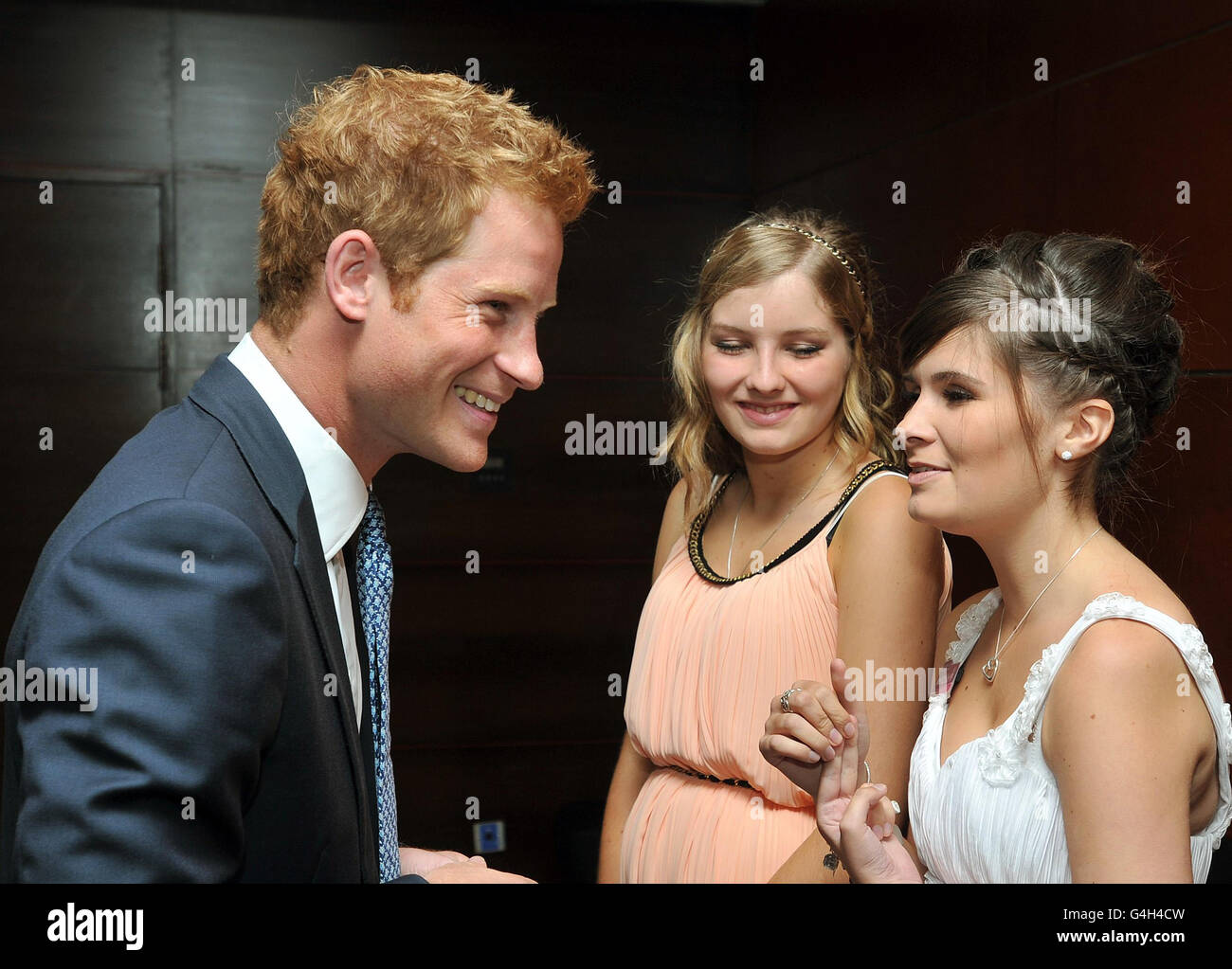 Prince Harry talks with 18-year-old Hannah Jones (right) from Chester ...