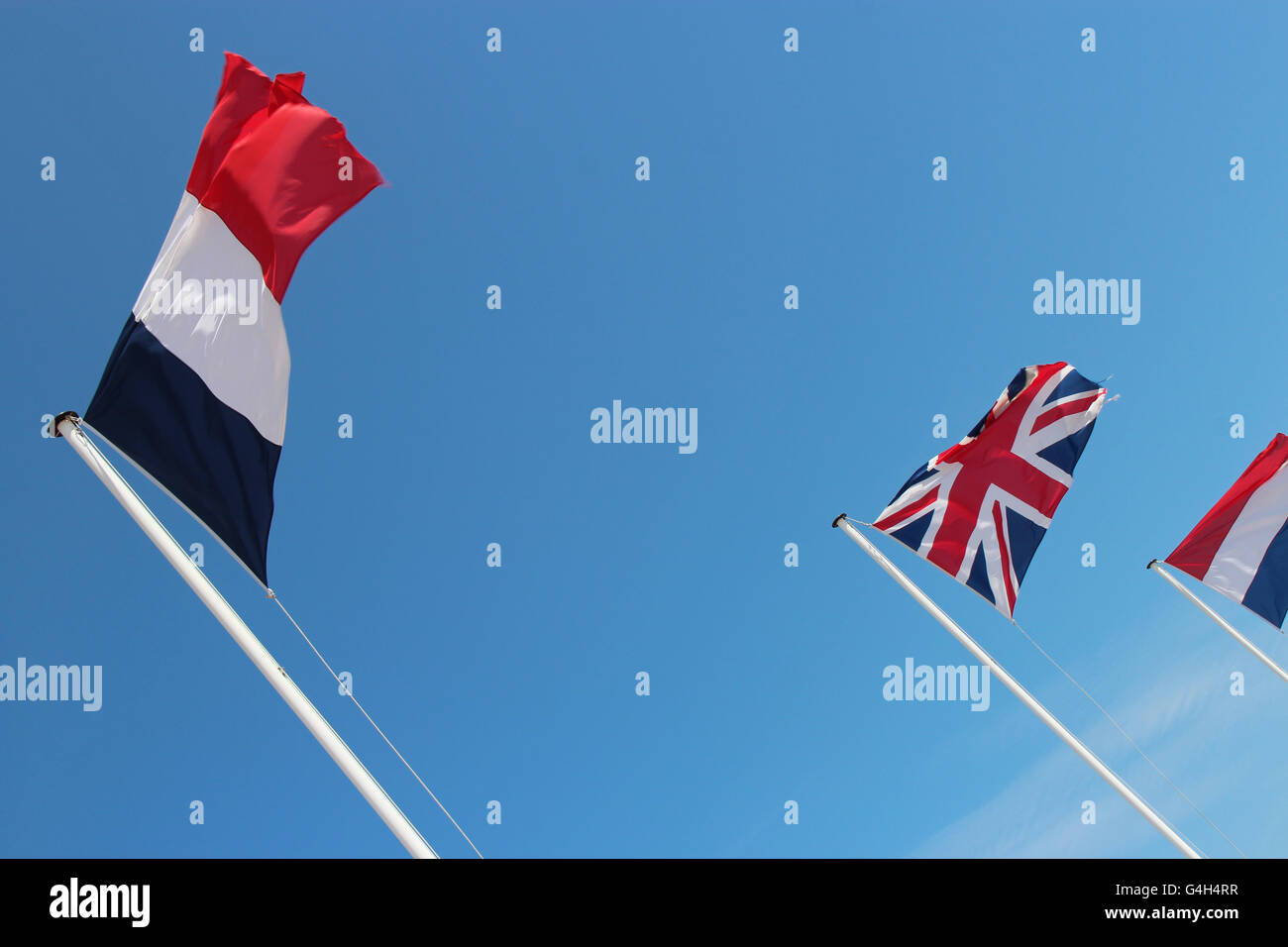 The French, English and Dutch flags on Omaha beach (France Stock Photo ...