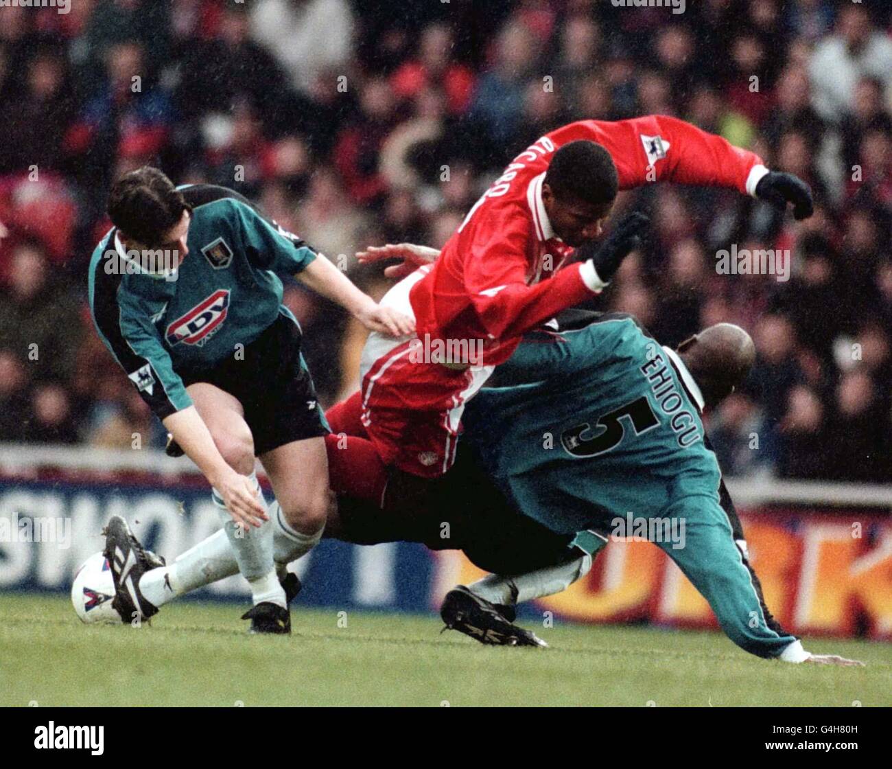 Middlesbrough's Hamilton Ricard (centre) is sandwiched between Ugo ...