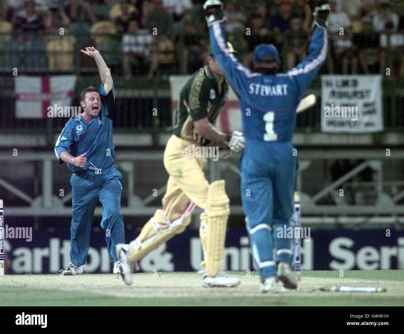 England's Robert Croft celebrates bowling out Brendon Julian at the ...
