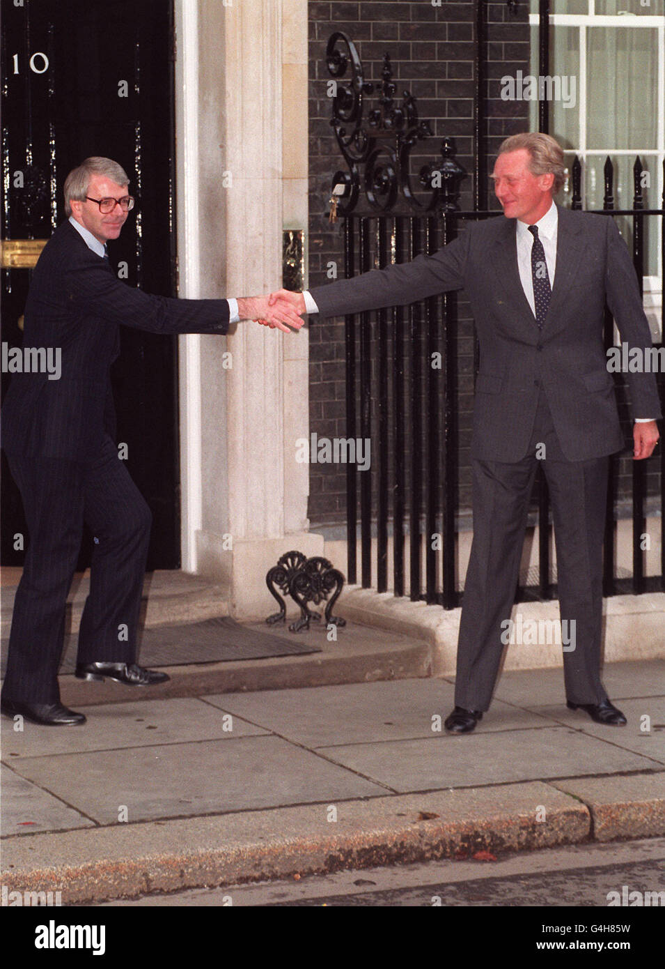 BRITAIN'S NEW PRIME MINISTER JOHN MAJOR SHAKING HANDS WITH MICHAEL ...