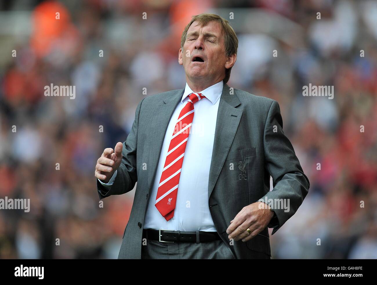 Liverpool manager kenny dalglish reacts on the touchline hi-res stock ...