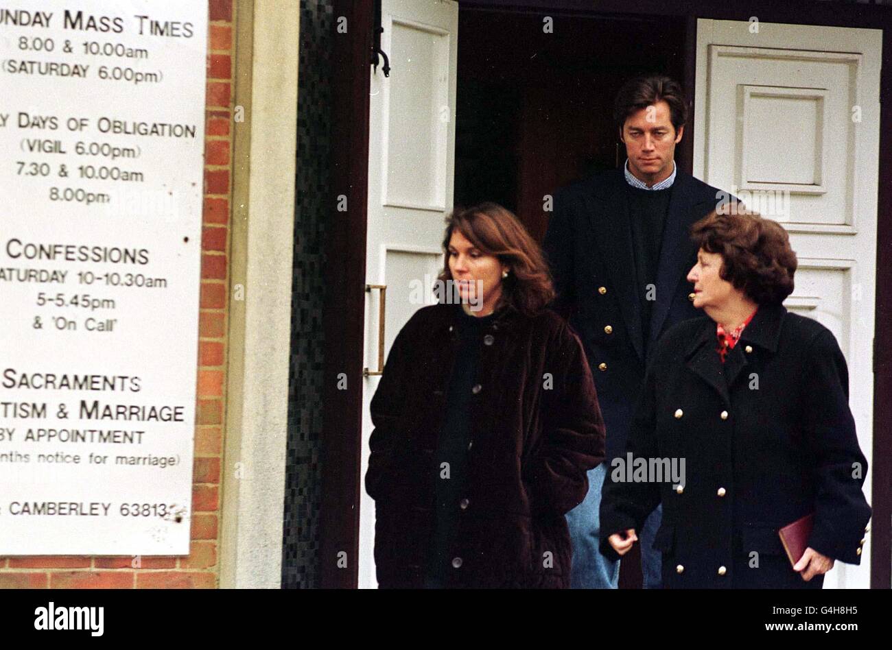 Pinochet relations leave church Stock Photo - Alamy
