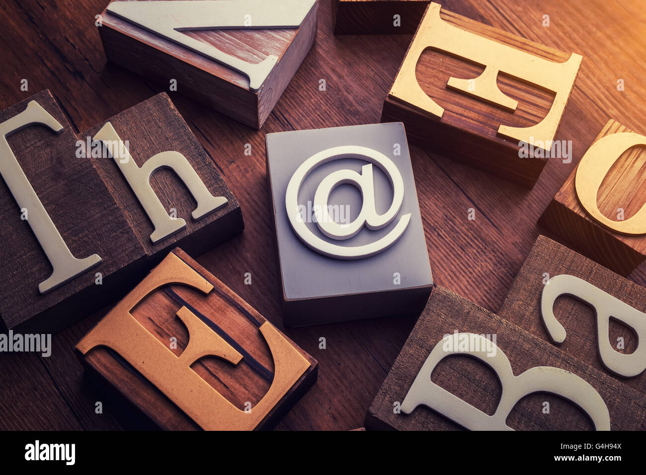 concept word forming with cube on wooden E-mail symbol Stock Photo - Alamy