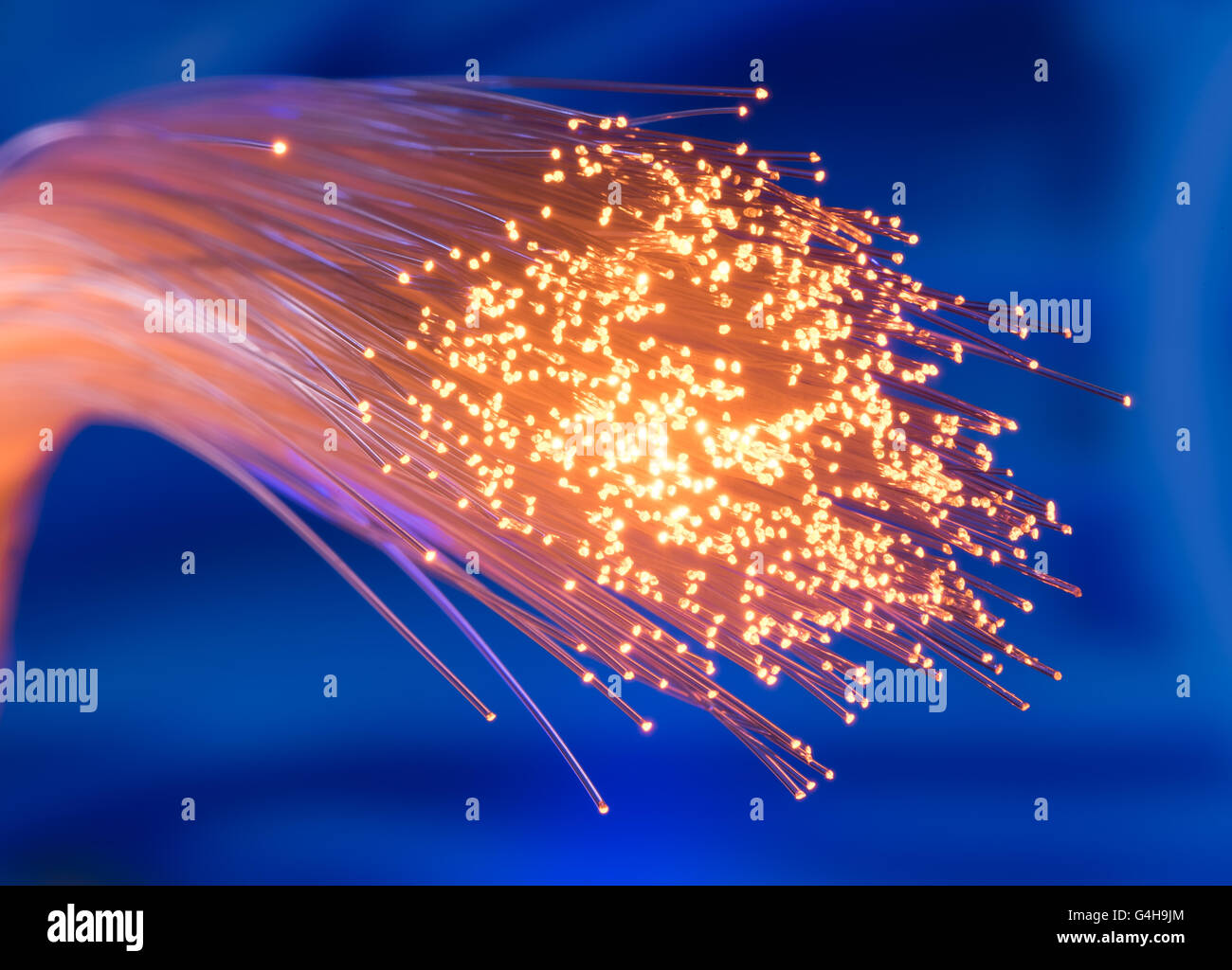 optical fibres dinamic flying from deep on technology background Stock ...