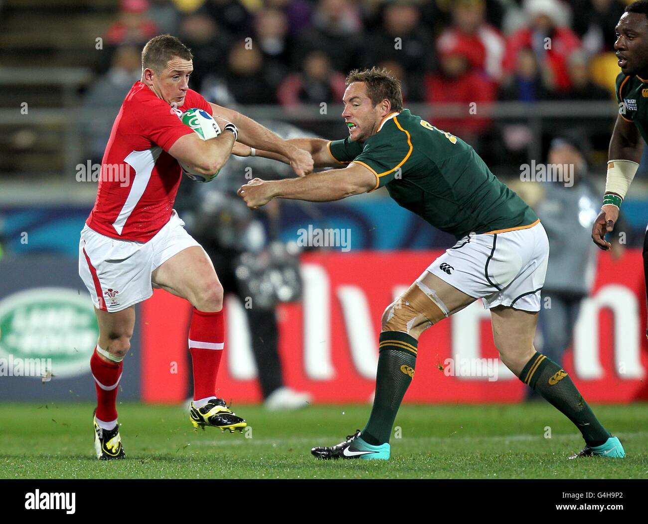 Wales' Shane Williams (left) in action with South Africa's Butch James ...