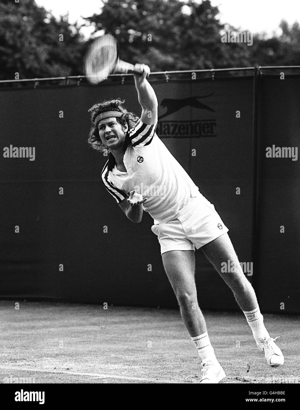 American tennis player John McEnroe, the number two seed, serves during ...
